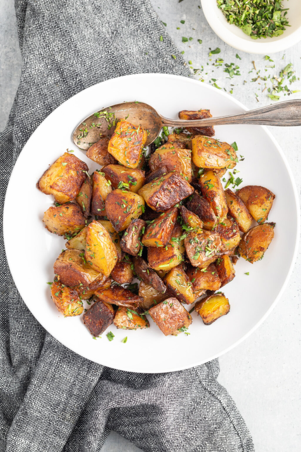 Crispy Herb Roasted Potatoes - Love Bakes Good Cakes